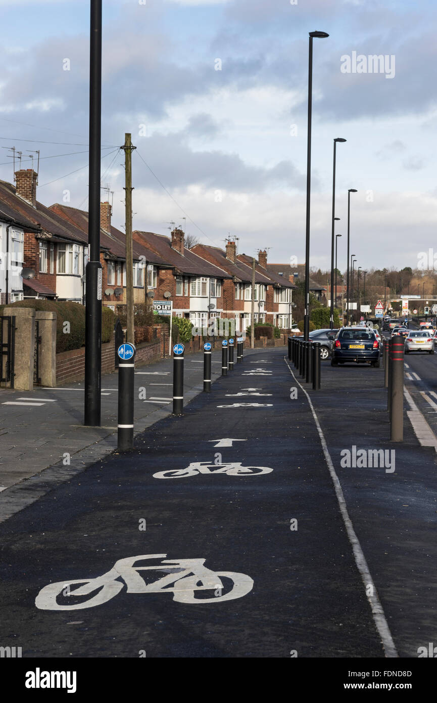 Cycle lane between road and pavement at Gosforth, Newcastle upon Tyne ...