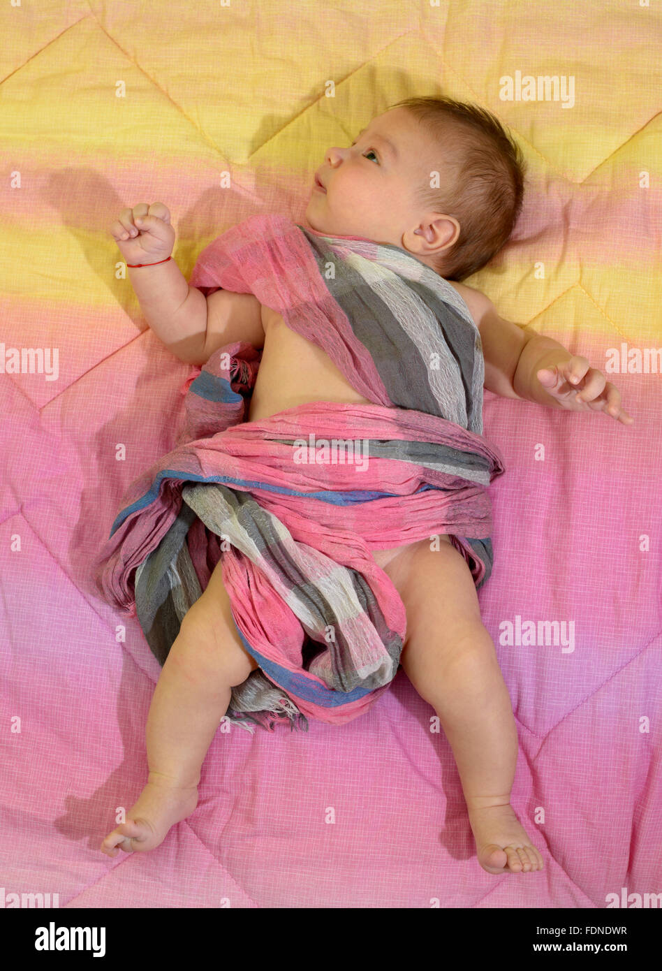 Baby wrapped in pink blanket hi-res stock photography and images - Alamy