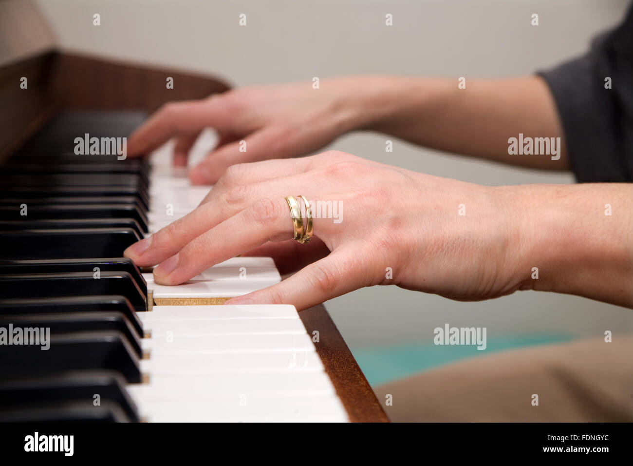Female Piano Player High Resolution Stock Photography and Images - Alamy