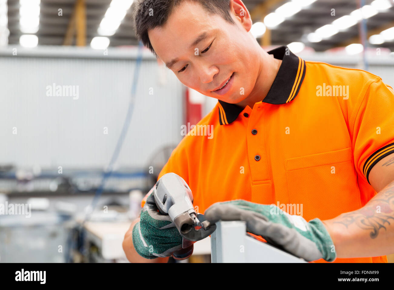 portrait of asian worker in production plant working on the factory ...