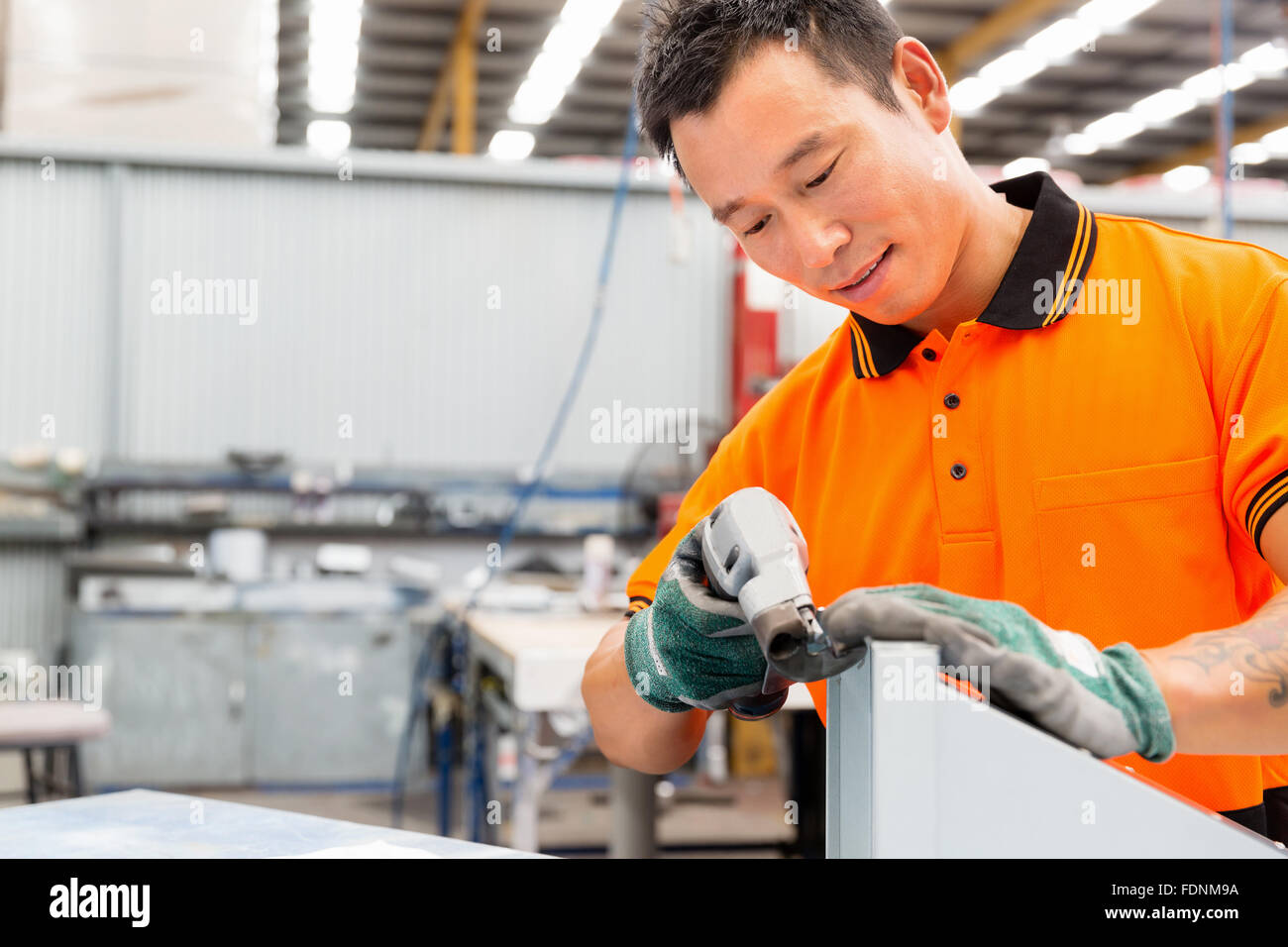 portrait of asian worker in production plant working on the factory ...