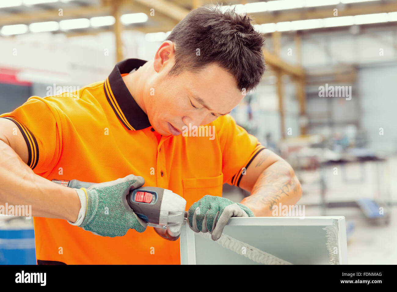 portrait of asian worker in production plant working on the factory ...