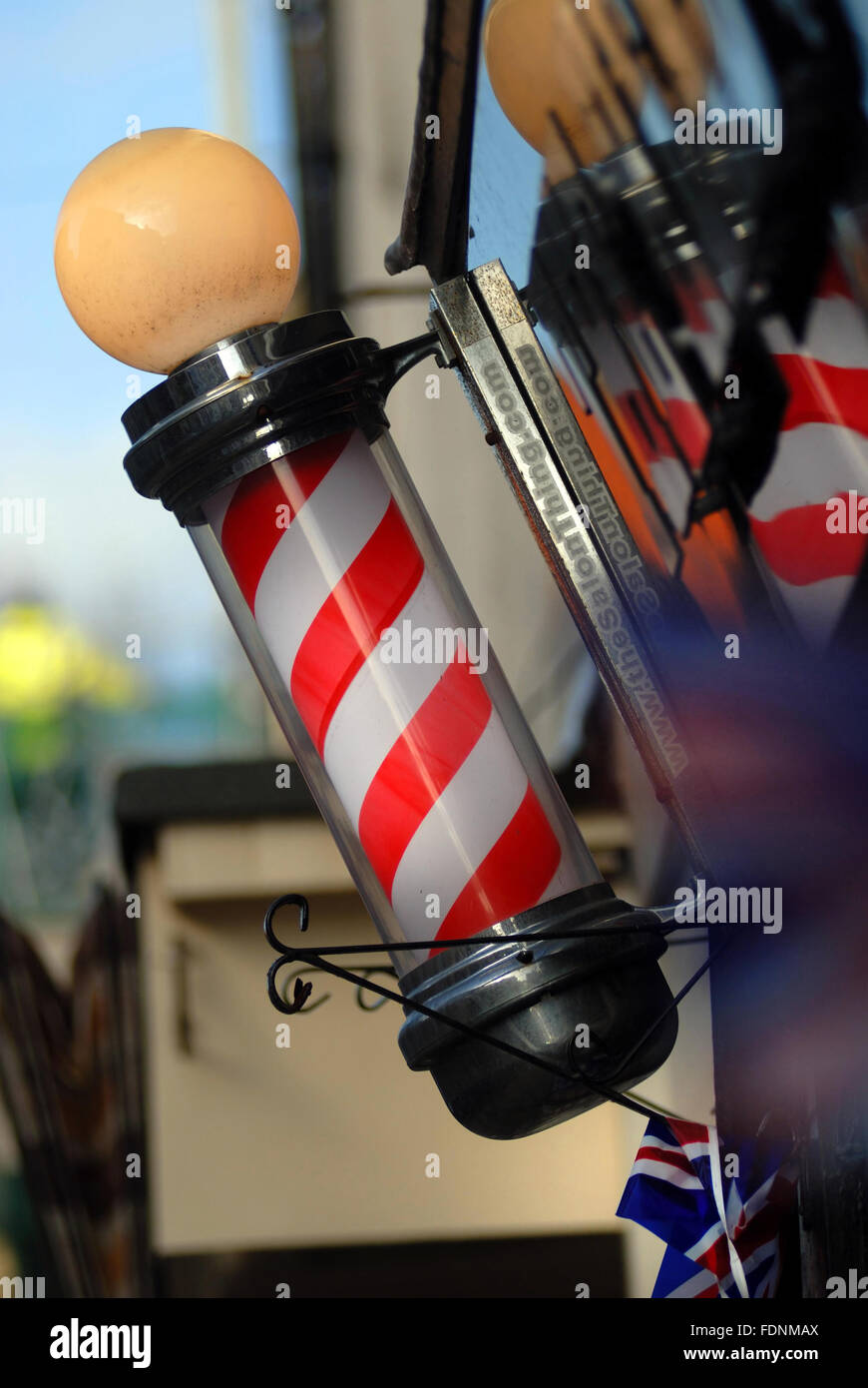 Barbers shop pole, Morpeth, Northumberland Stock Photo - Alamy