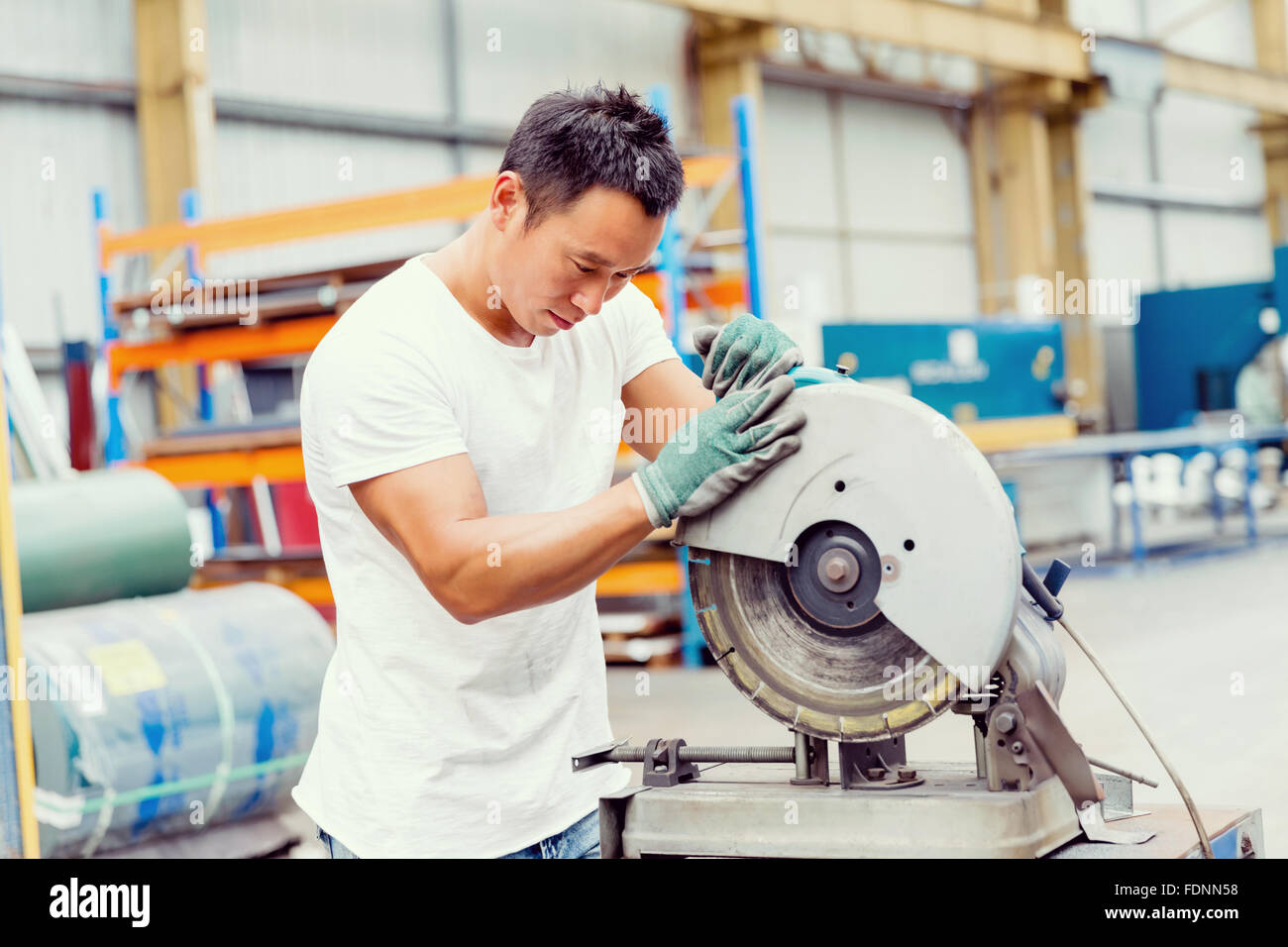 portrait of asian worker in production plant working on the factory ...