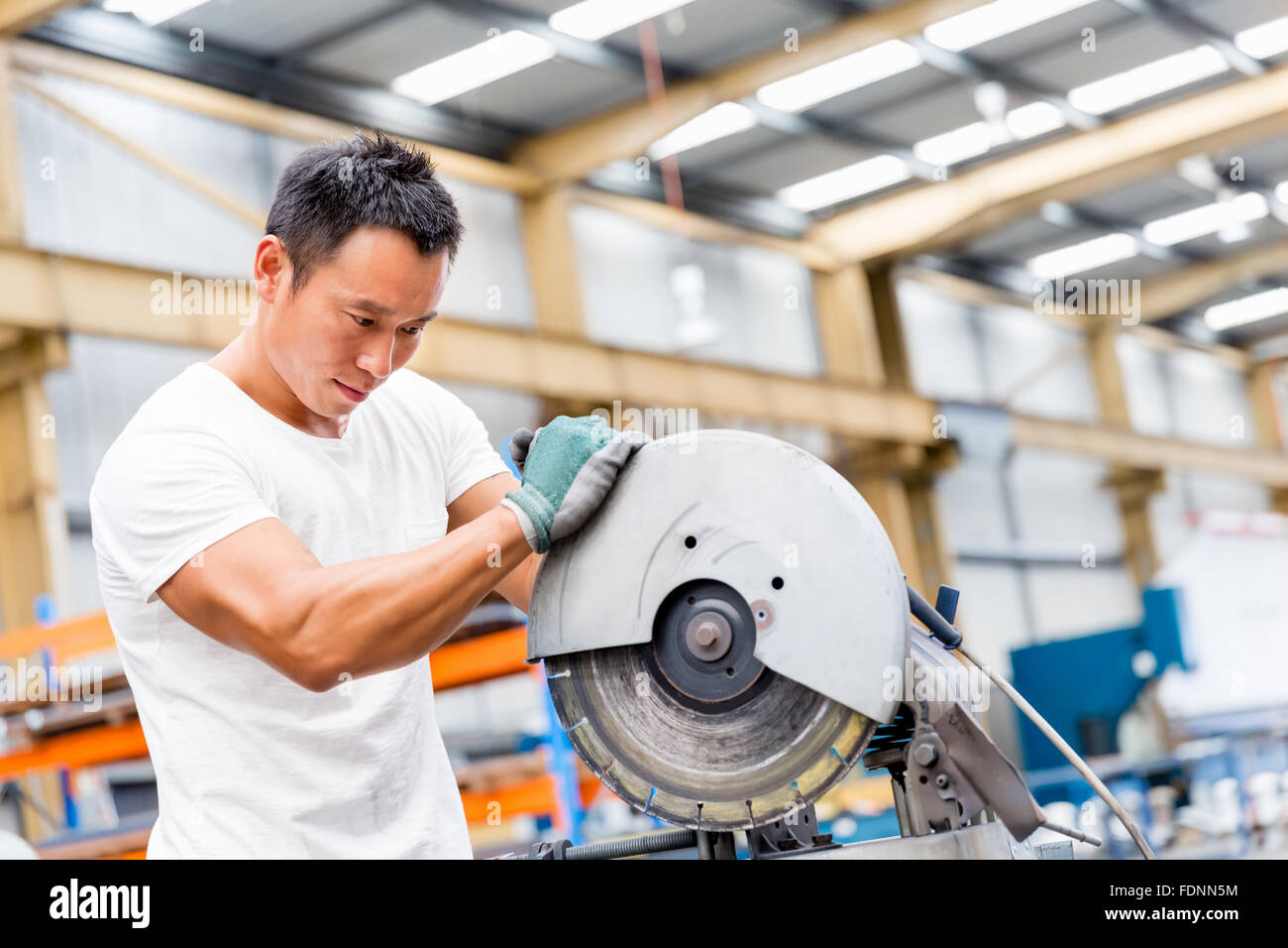 portrait of asian worker in production plant working on the factory ...