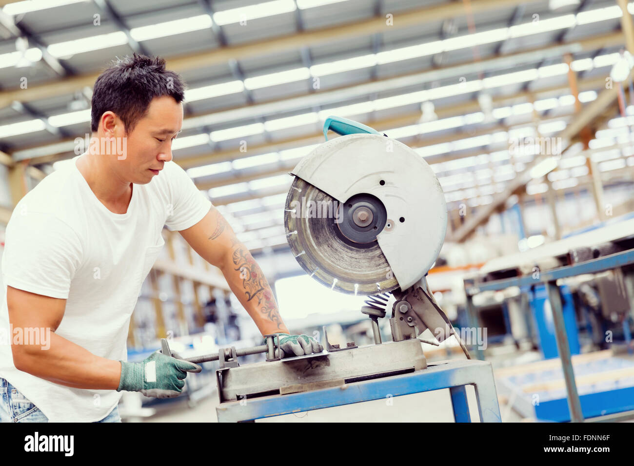 portrait of asian worker in production plant working on the factory ...