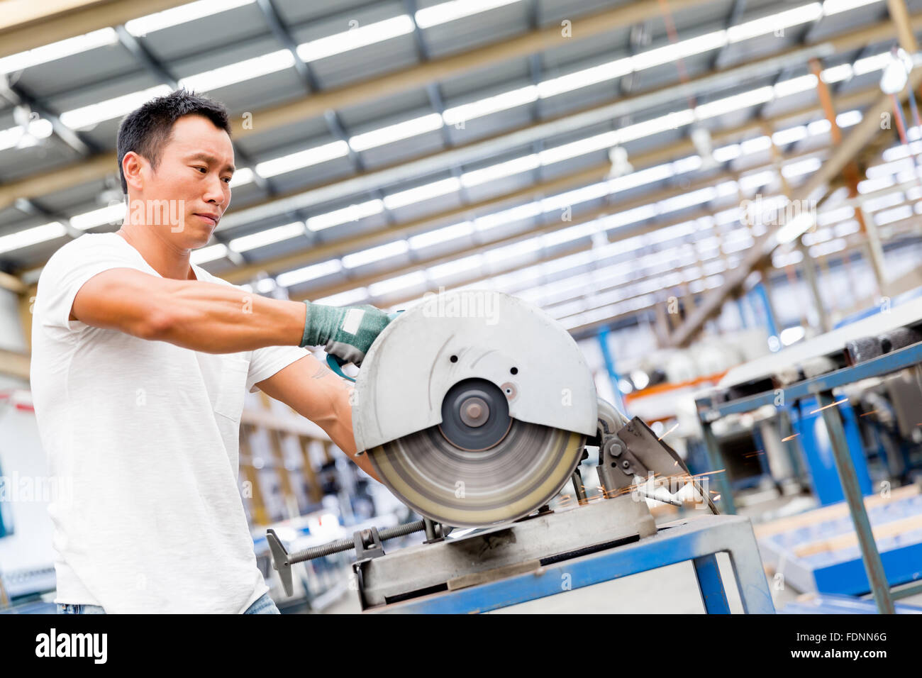 portrait of asian worker in production plant working on the factory ...
