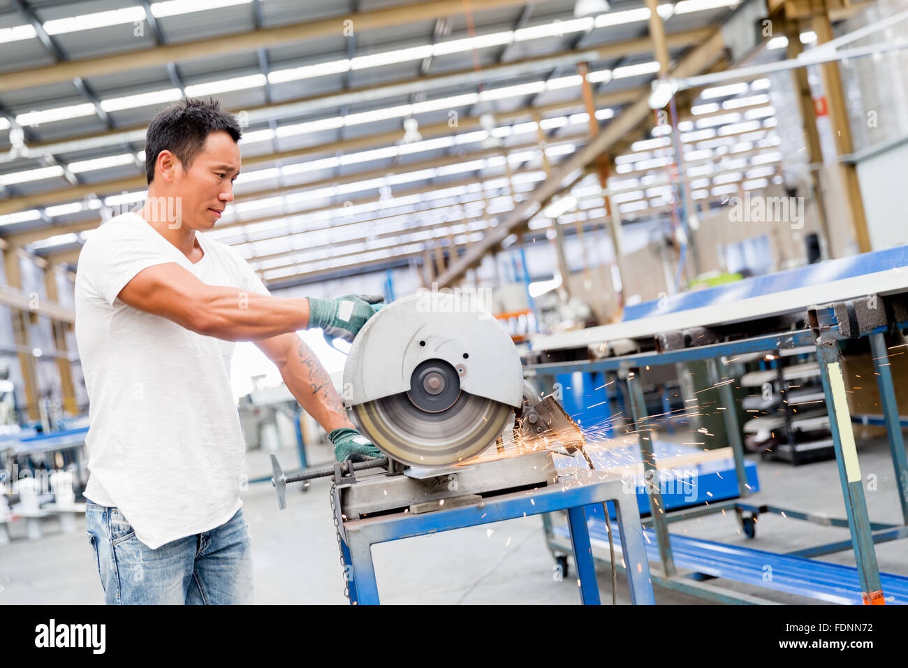 portrait of asian worker in production plant working on the factory ...