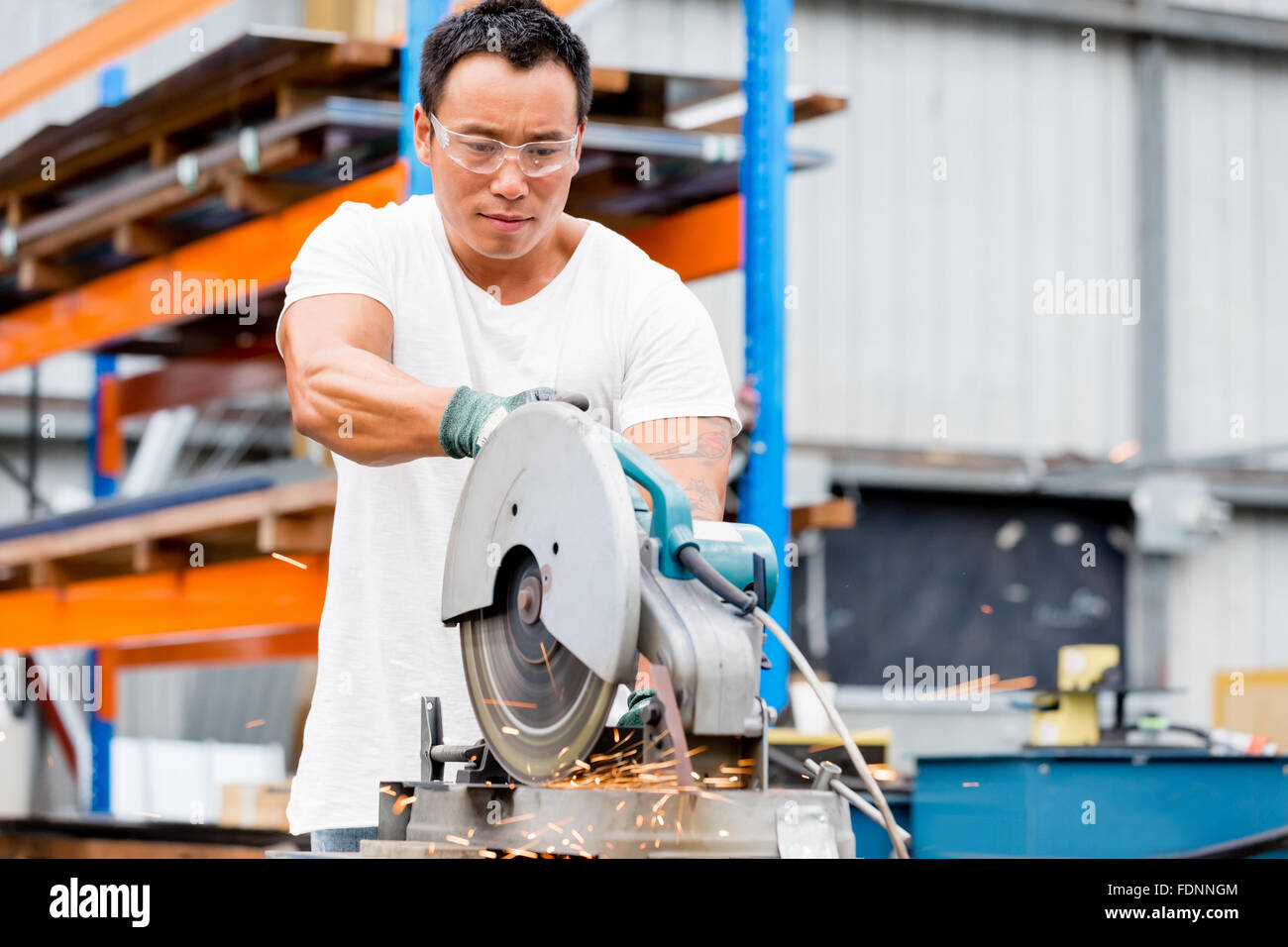 portrait of asian worker in production plant working on the factory ...