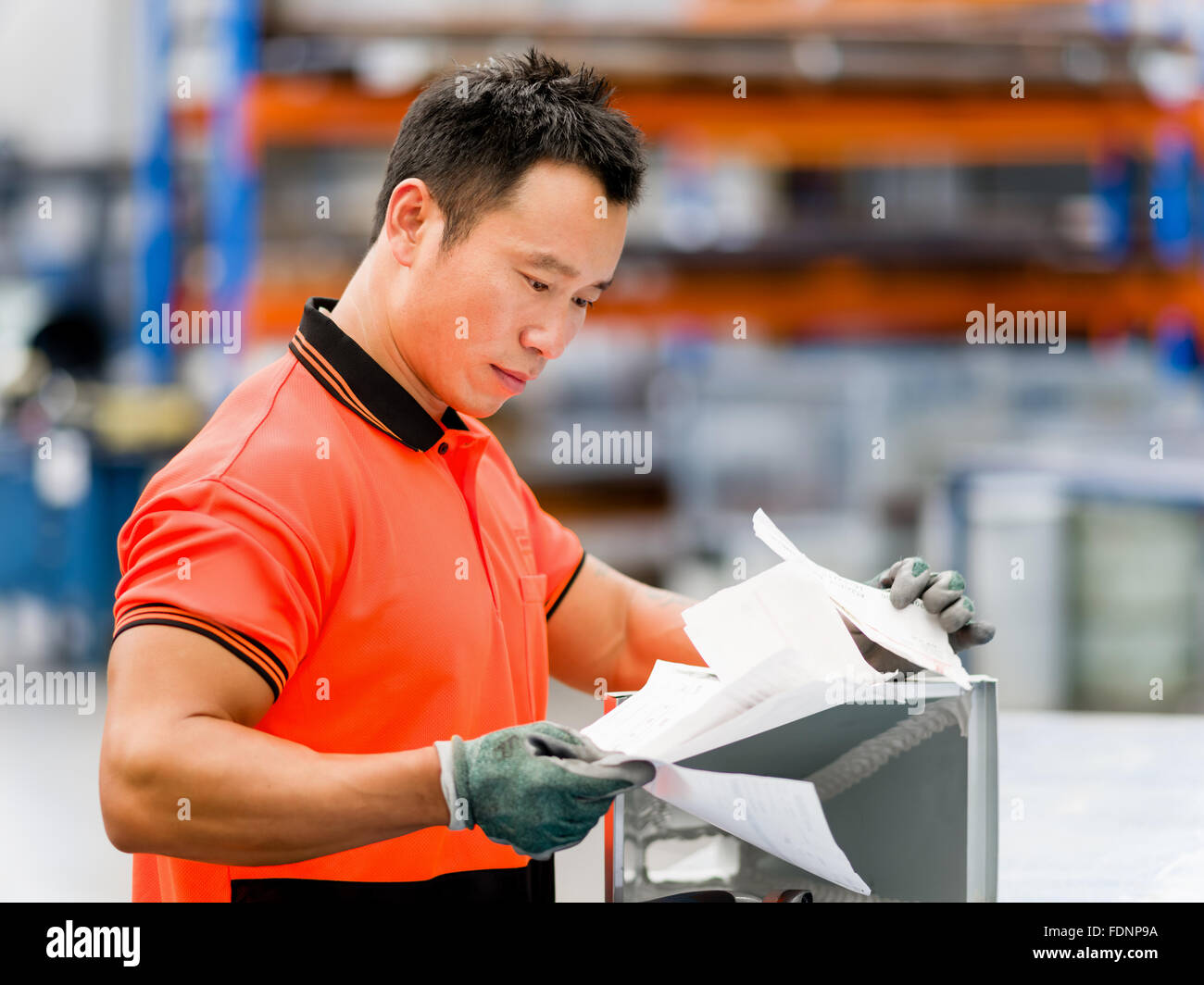 portrait of asian worker in production plant working on the factory ...