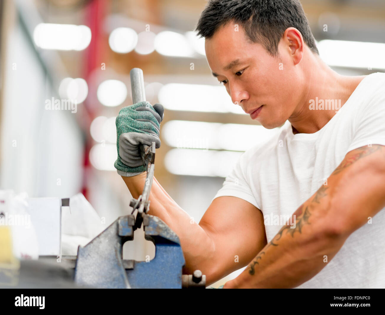 portrait of asian worker in production plant working on the factory ...