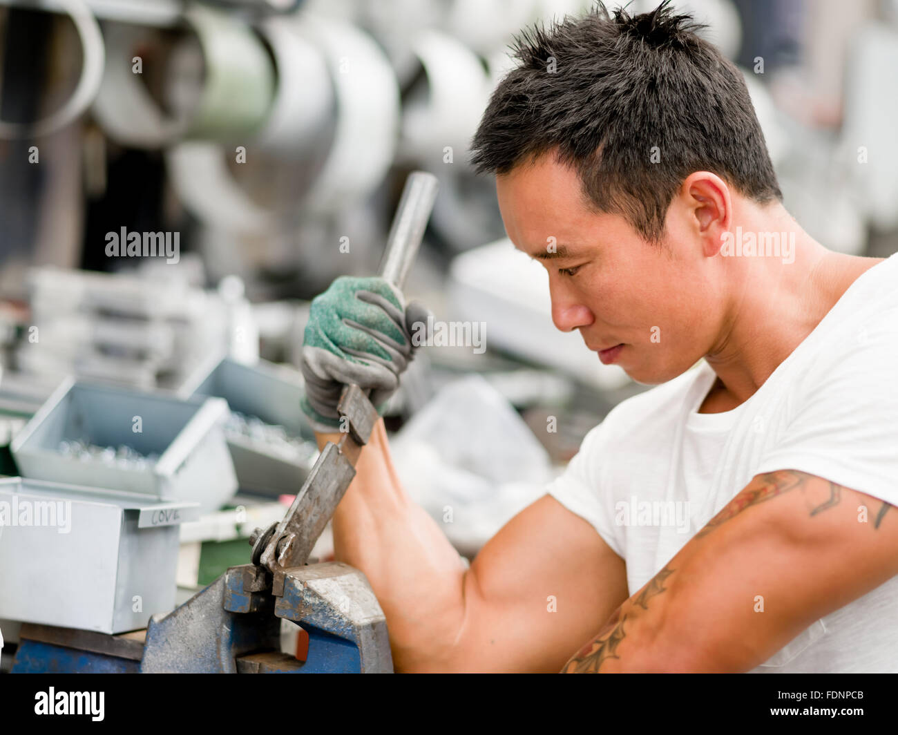 portrait of asian worker in production plant working on the factory ...