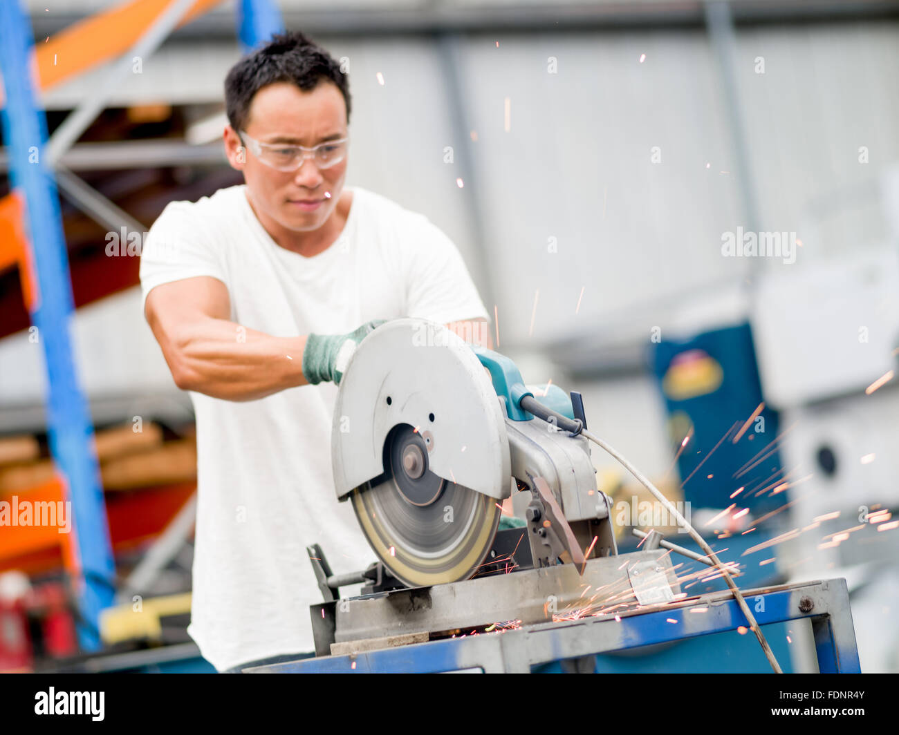 portrait of asian worker in production plant working on the factory ...