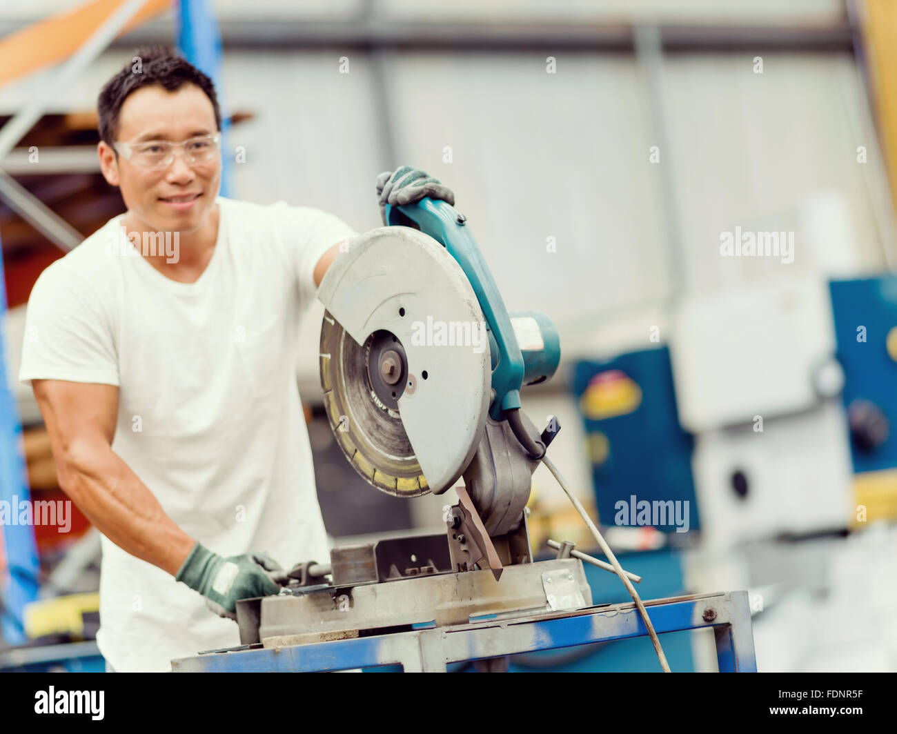 portrait of asian worker in production plant working on the factory ...