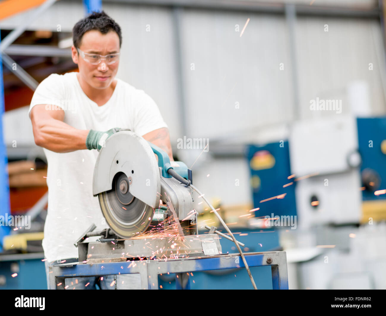 portrait of asian worker in production plant working on the factory ...