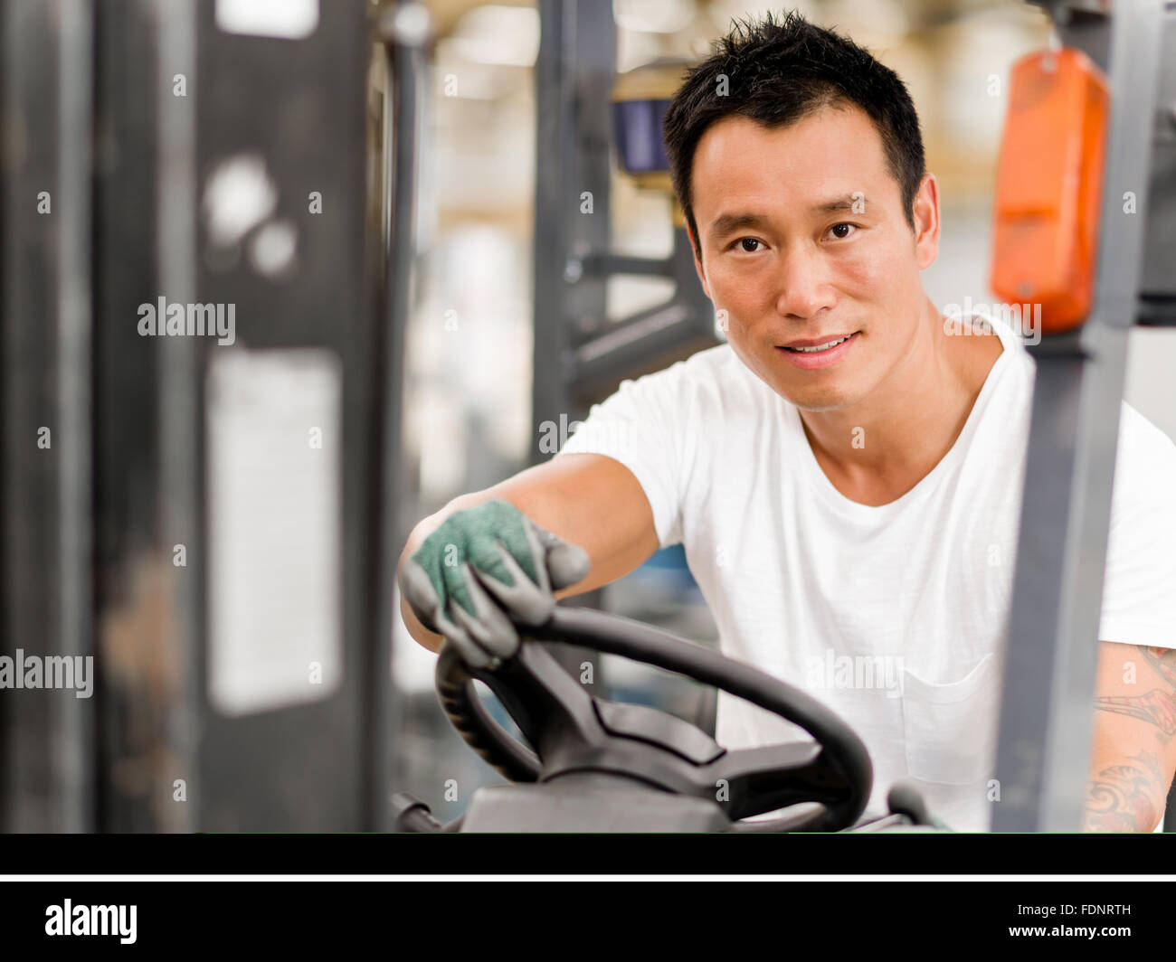 portrait of asian worker in production plant working on the factory ...