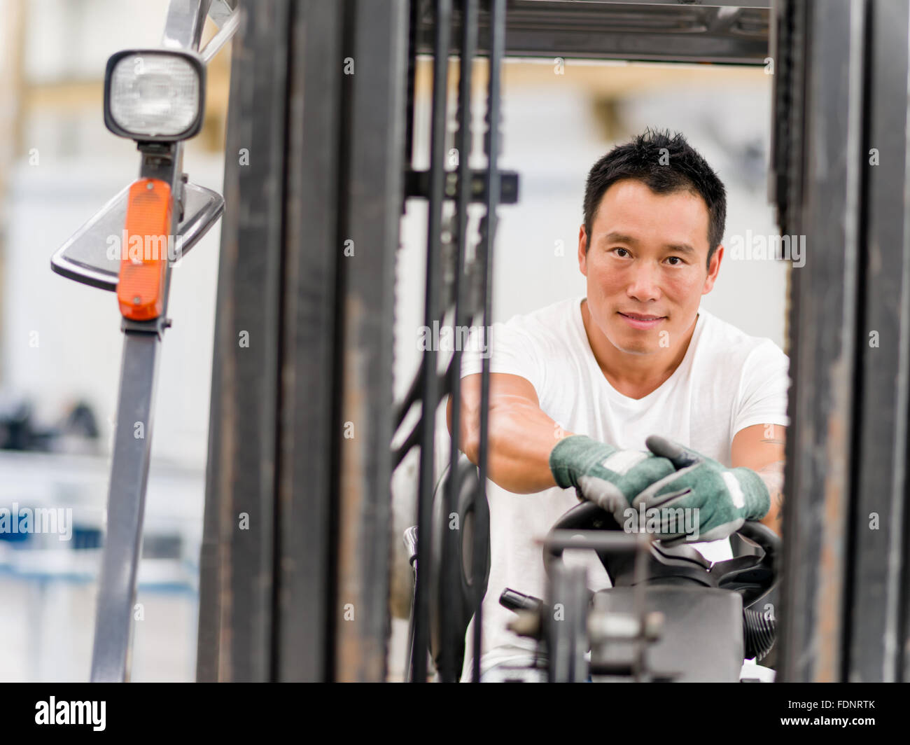 portrait of asian worker in production plant working on the factory ...