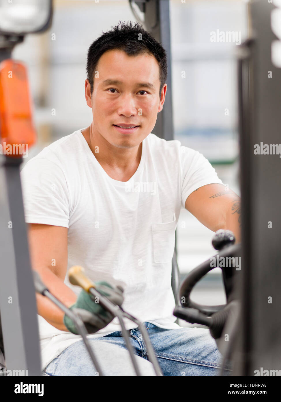 portrait of asian worker in production plant working on the factory ...