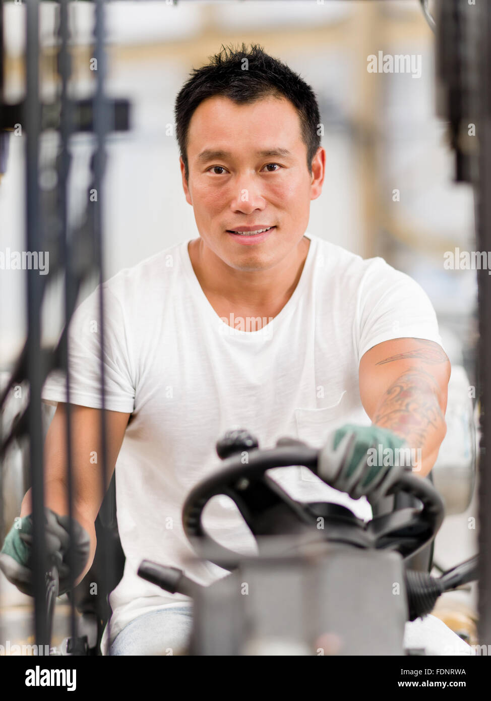 portrait of asian worker in production plant working on the factory ...