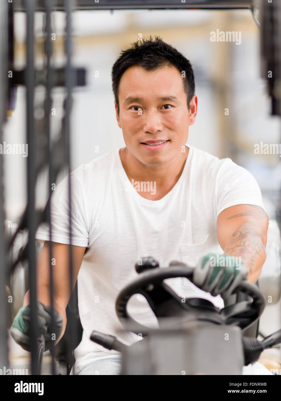 portrait of asian worker in production plant working on the factory ...
