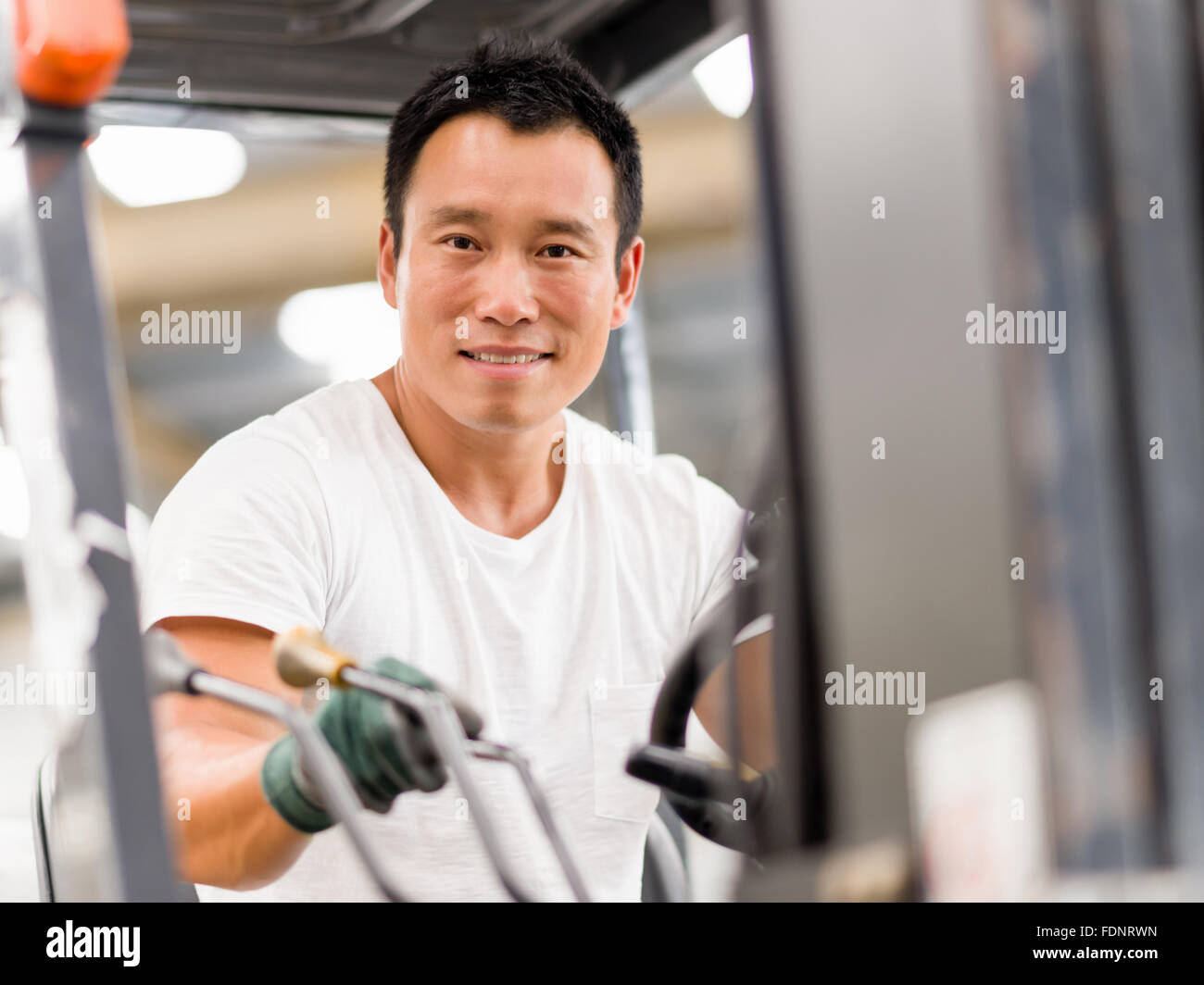 portrait of asian worker in production plant working on the factory ...