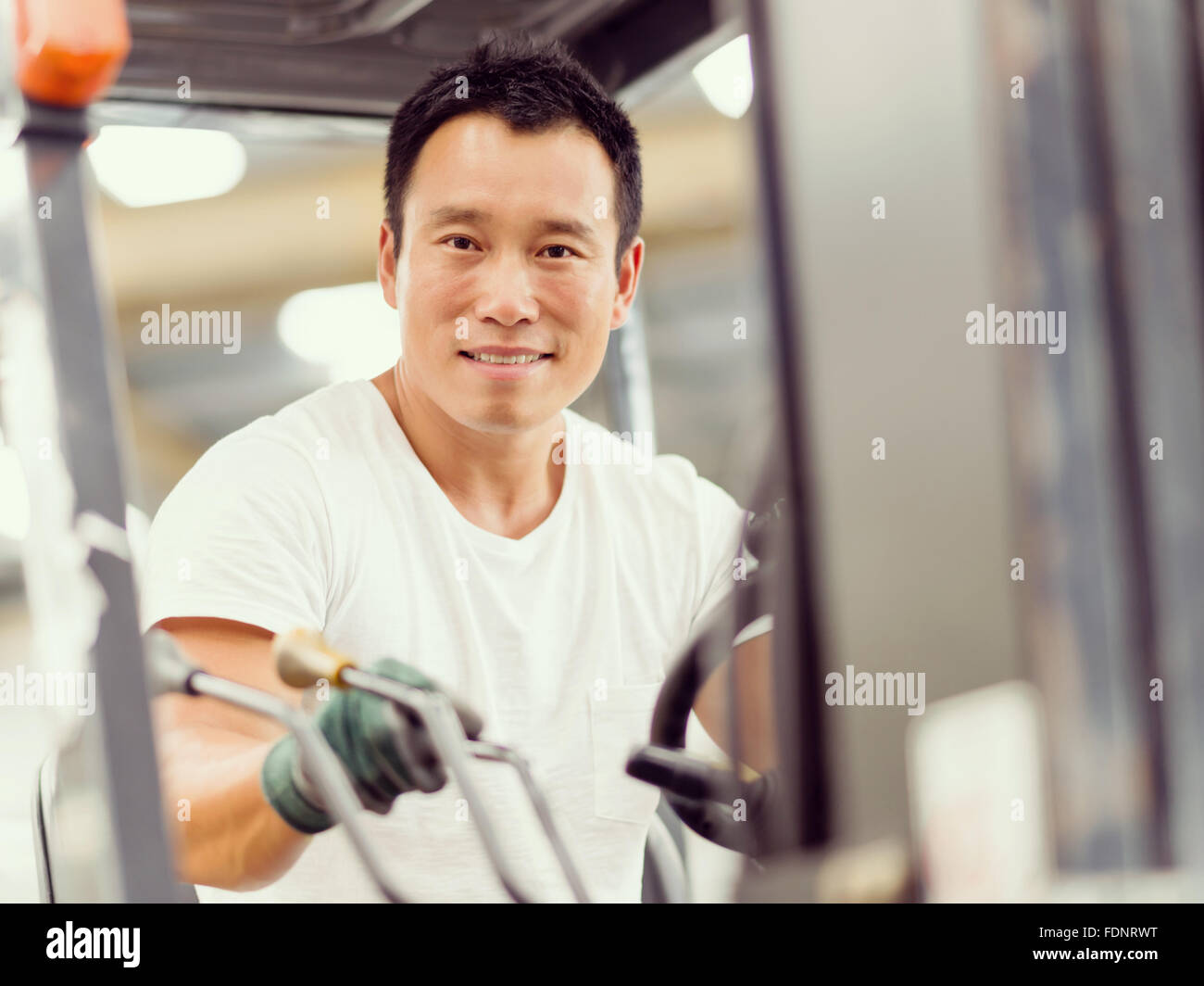portrait of asian worker in production plant working on the factory ...