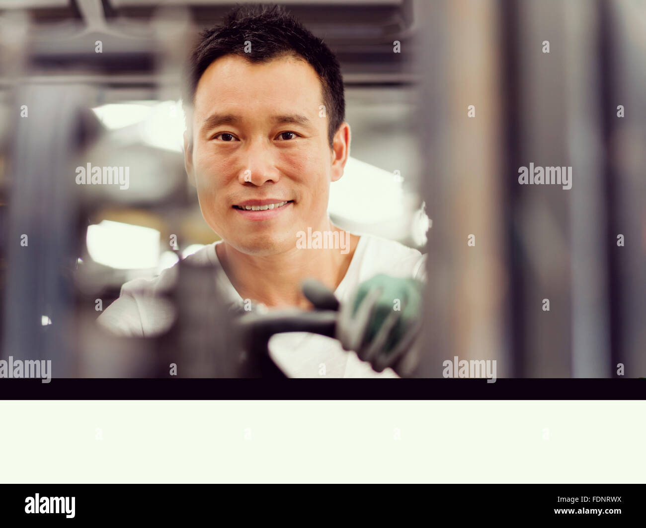 portrait of asian worker in production plant working on the factory ...