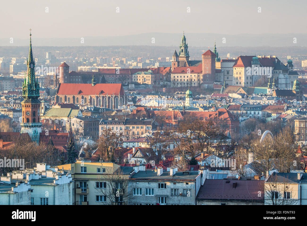 Panoramic view of Royal Wawel Castle in Krakow and St. Mary's Basilica ...
