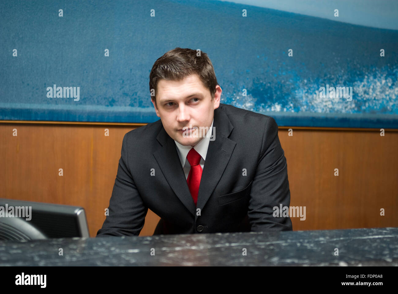 Hotel receptionist male hi-res stock photography and images - Alamy