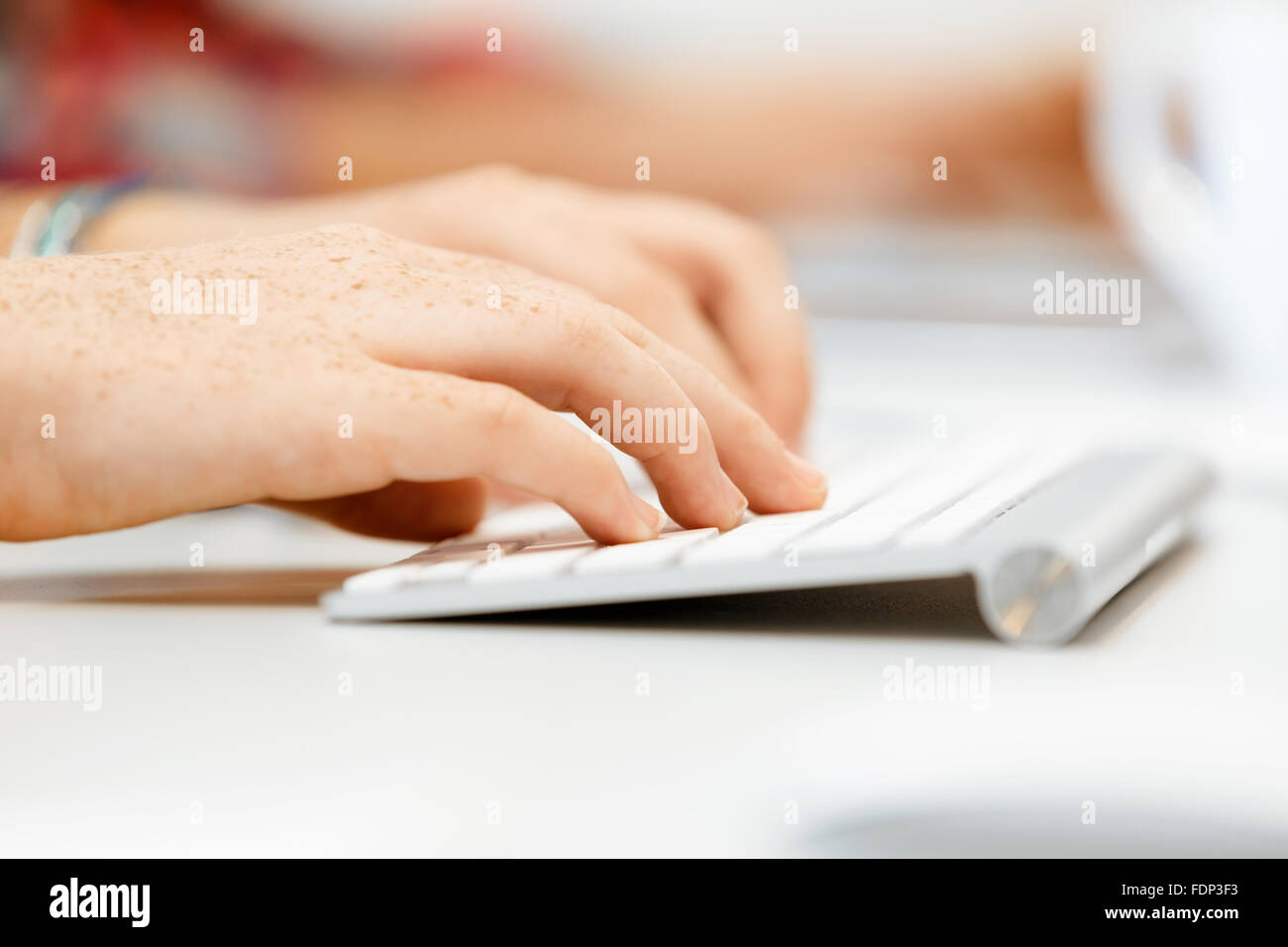 Hands of office worker typing on the keyboard Stock Photo - Alamy