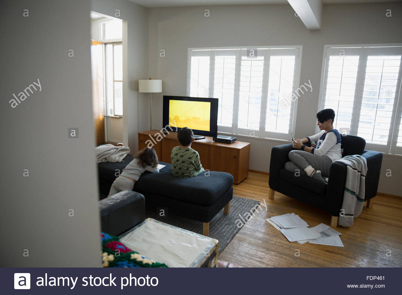 Sitting watching tv communication technology television hi-res stock ...
