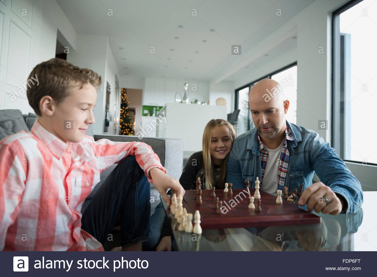 Child watching children playing hi-res stock photography and images - Alamy