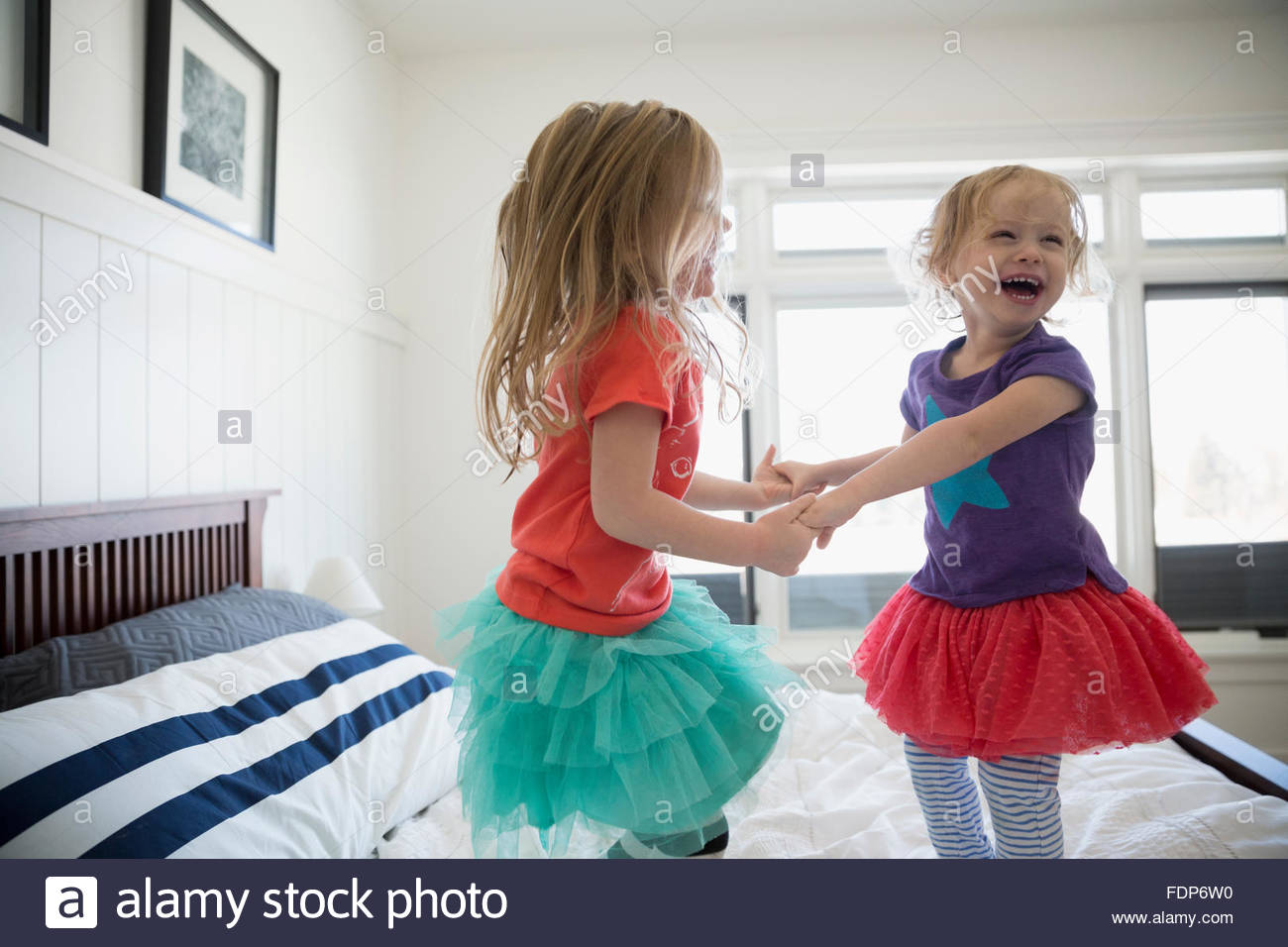 Girl dancing bed hi-res stock photography and images - Alamy