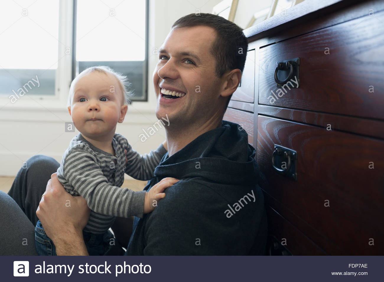 Adult baby laughing hi-res stock photography and images - Alamy