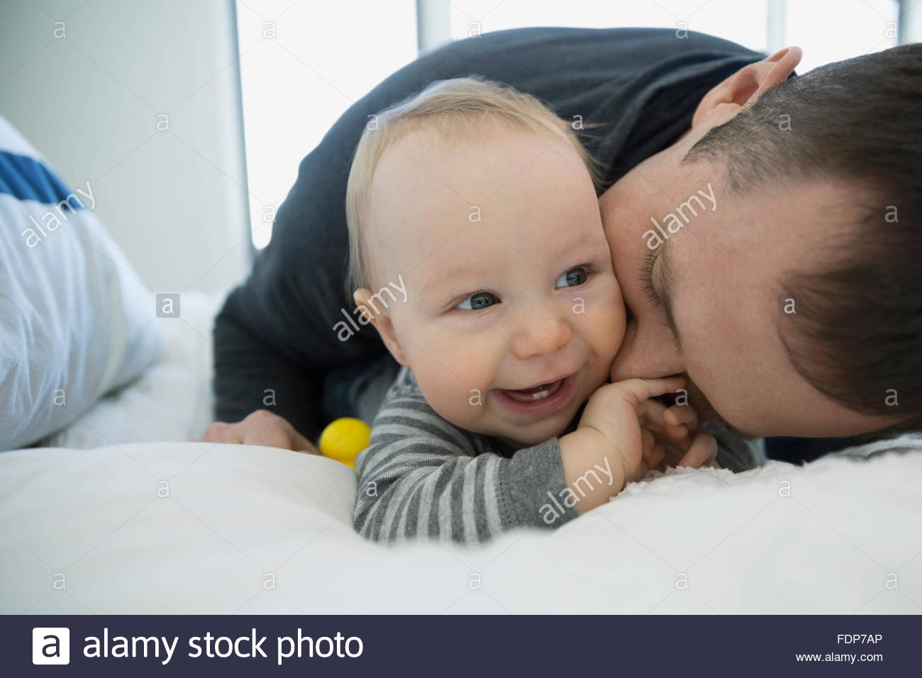 Boy looking up father hi-res stock photography and images - Alamy