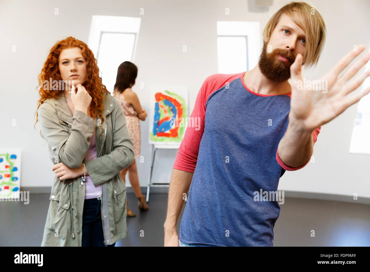Couple artists talking painting hi-res stock photography and images - Alamy