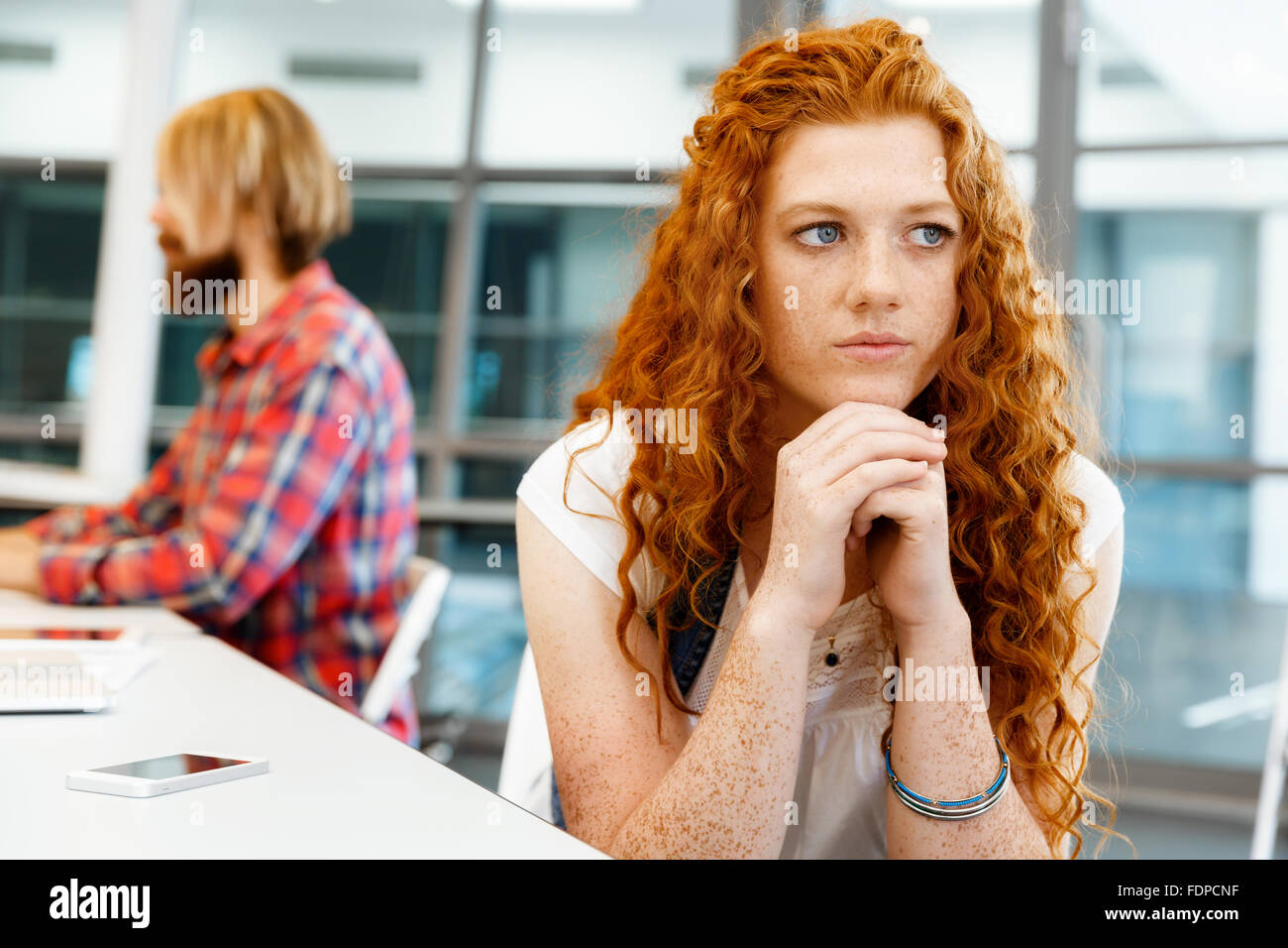 Young and pretty business woman working in office Stock Photo - Alamy