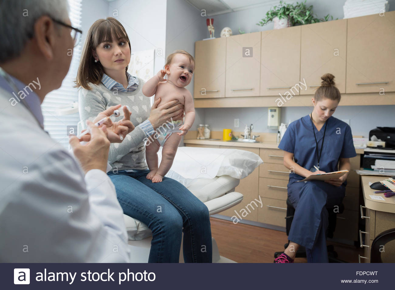 Doctor Injection Baby Stock Photos & Doctor Injection Baby Stock Images ...