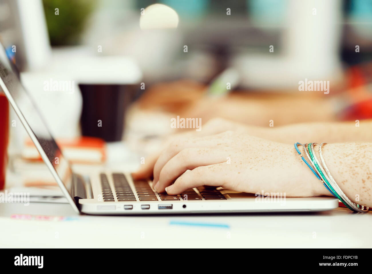 Hands of office worker typing on the keyboard Stock Photo - Alamy