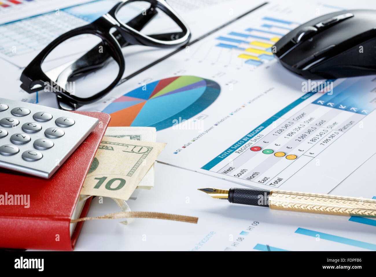 financial charts and graphs and glasses on the office table Stock Photo ...
