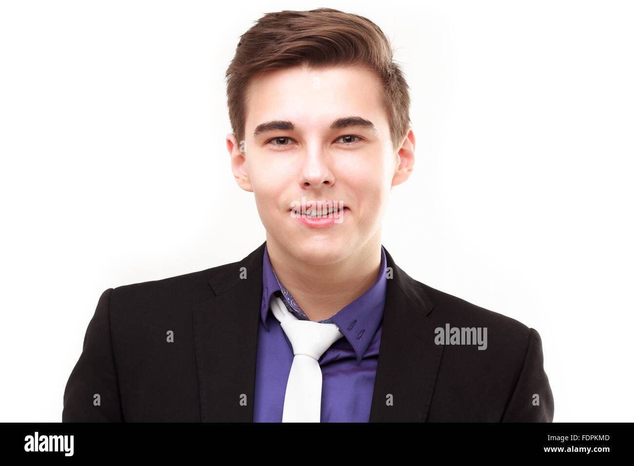 Close-up portrait of young business man wearing suit and tie isolated ...