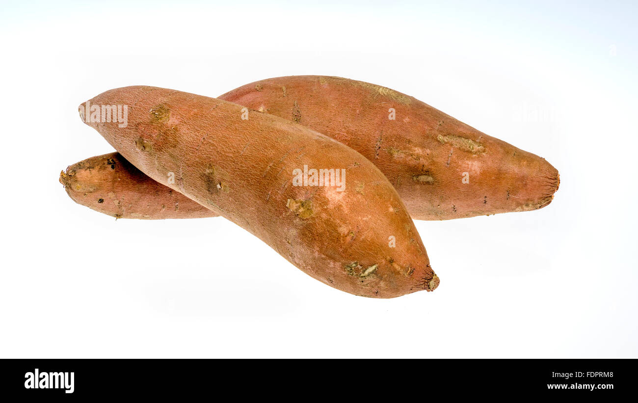 Two ripe yams on ready for cooking Stock Photo - Alamy