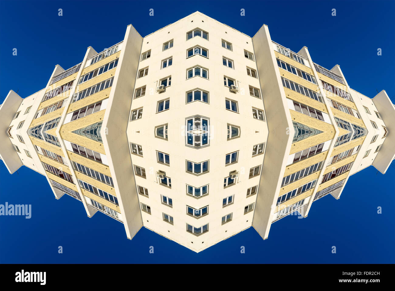 Architecture abstract of a white apartment building block set against a ...