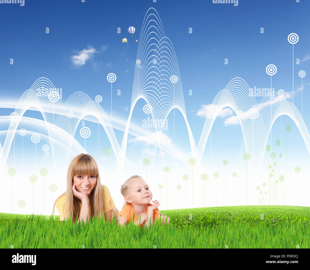Young happy family outdoor on the ground Stock Photo - Alamy