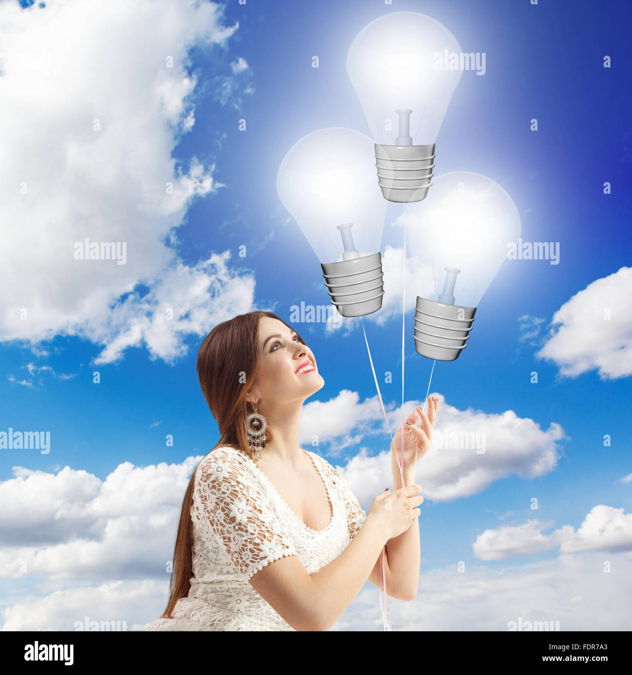 Woman and lightbulb hi-res stock photography and images - Alamy