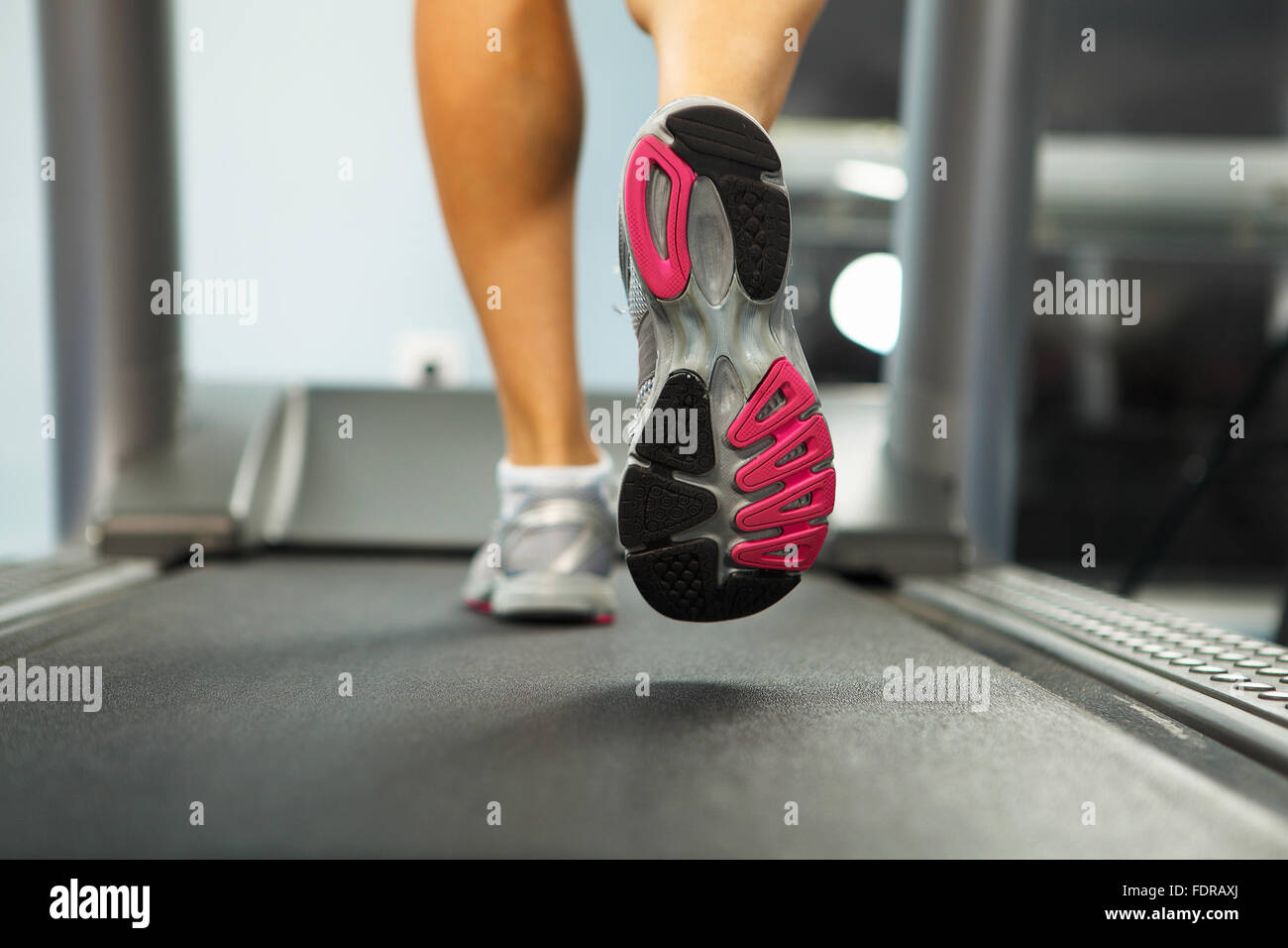 Image of female foot running on treadmill Stock Photo - Alamy