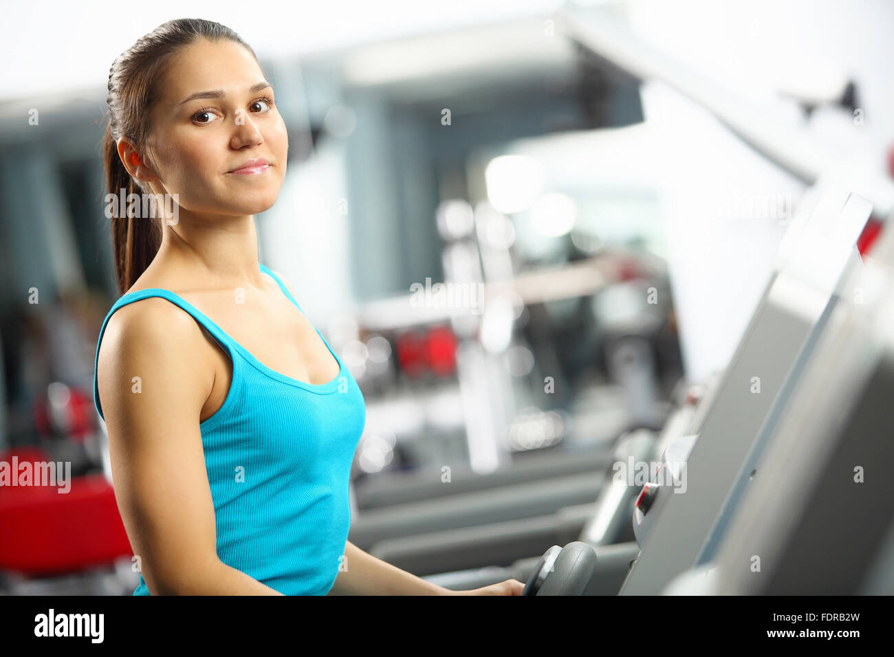 Image of fitness girl running on treadmill Stock Photo - Alamy