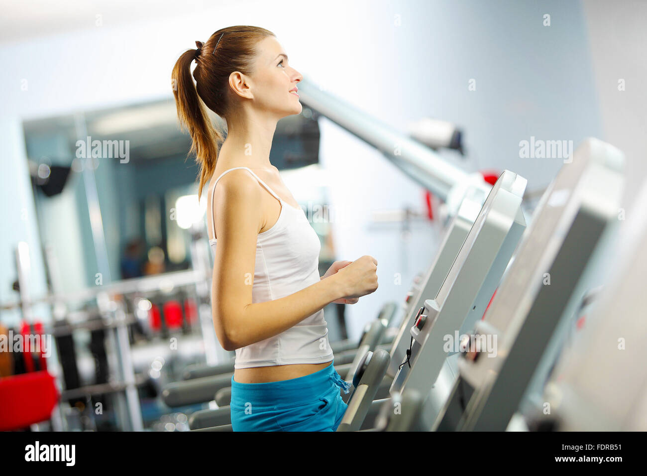 Image of fitness girl running on treadmill Stock Photo - Alamy
