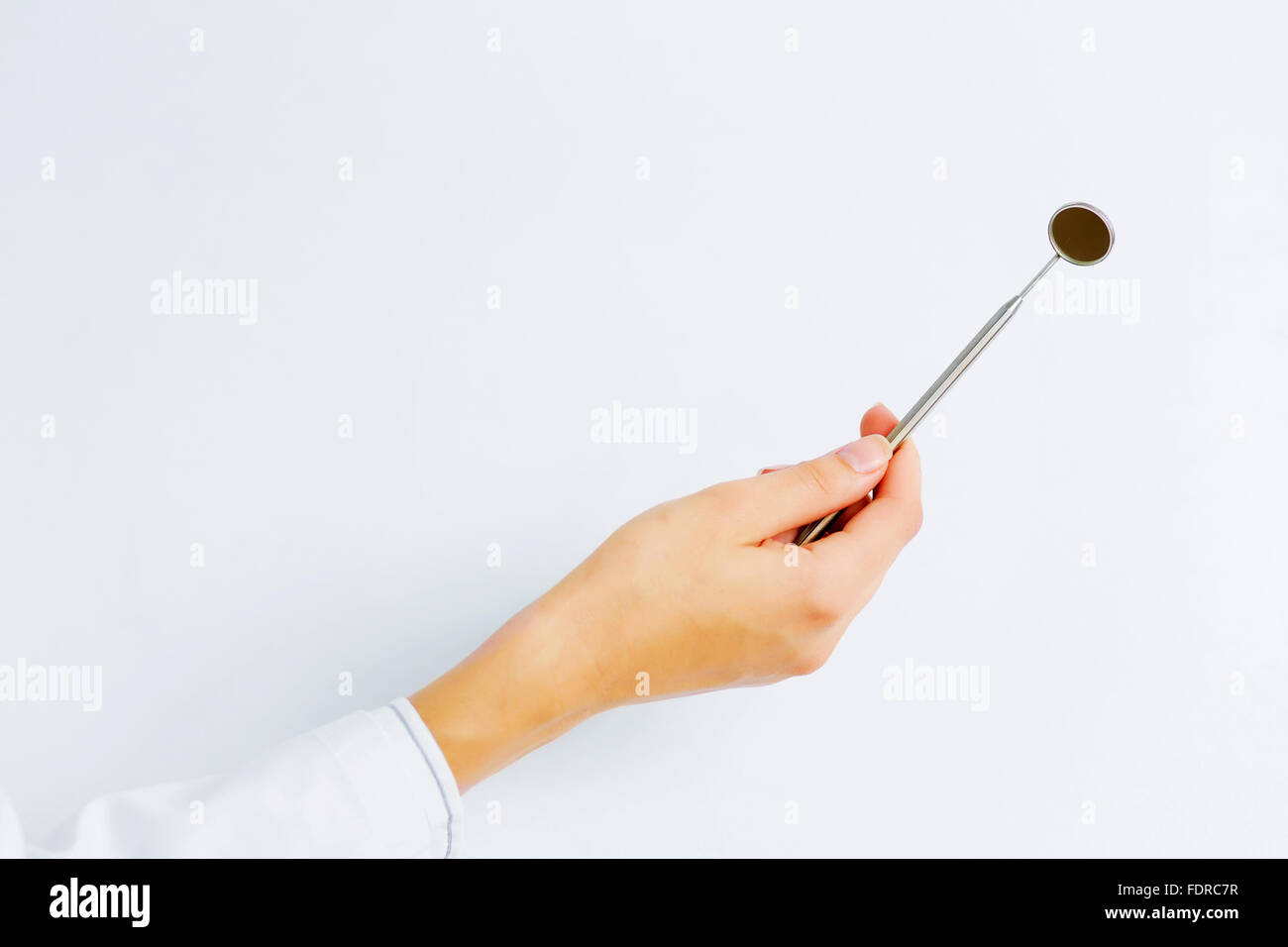 Close up of doctor's hand holding medical tool Stock Photo - Alamy