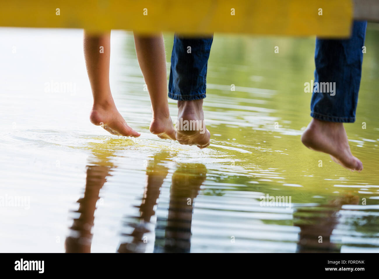 Child fishing legs hi-res stock photography and images - Alamy